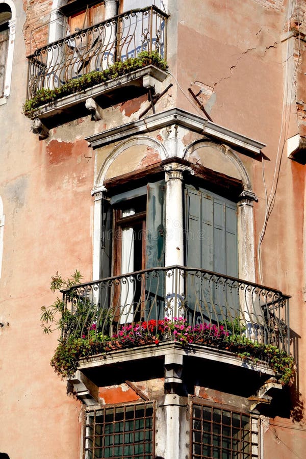 Antique windows in Venice stock photo. Image of facade - 116609626