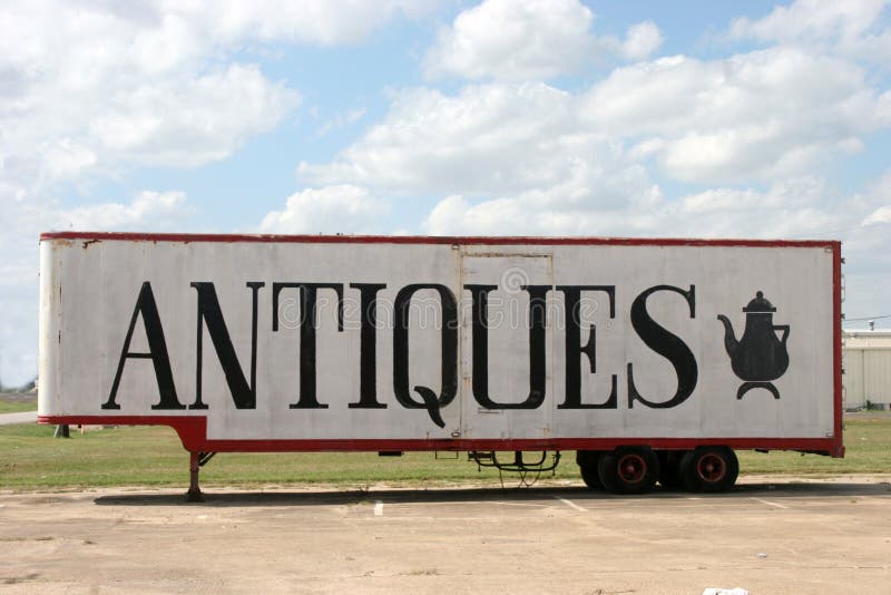 Antiques Sign on Side of Trailer Stock Image - Image of sign, word ...