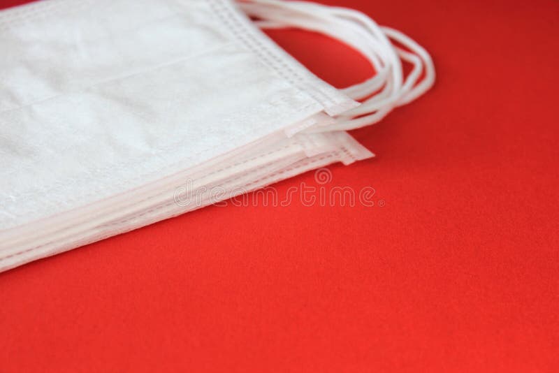 Antiviral Masks on Red Background with Copy Space. Protective Masks ...