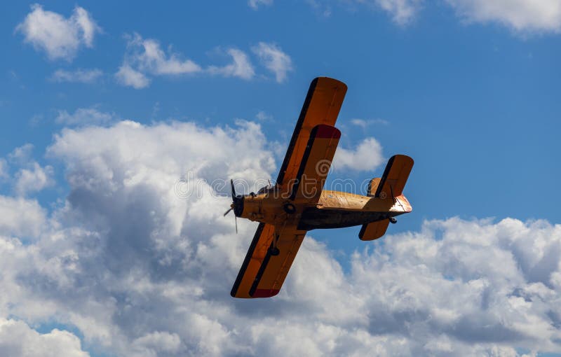Antonov an-2 Biplane Fly on Cloudy Sky. Old Yellow Historic Plane from ...