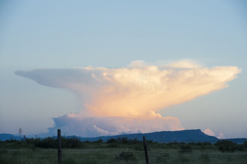 Anvil Cloud Thunderstorm in the Distance Stock Photo - Image of sunset ...