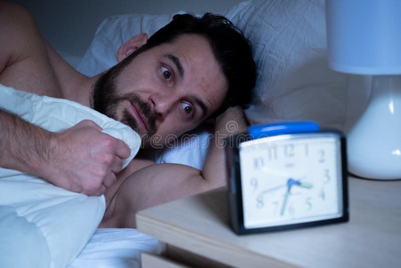 Stressed Sleepless Man Expression Lying in the Bed Stock Photo - Image ...