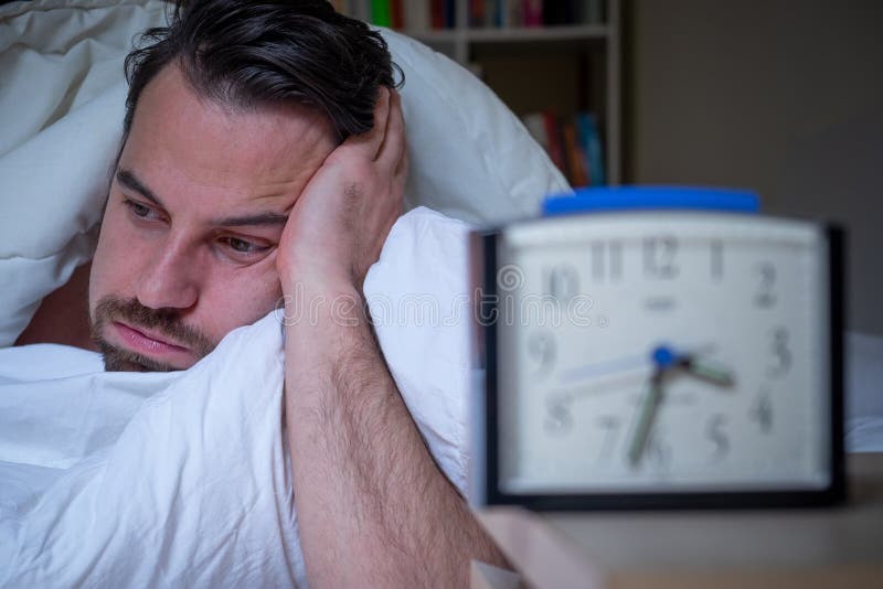Stressed Sleepless Man Expression Lying in the Bed Stock Photo - Image ...