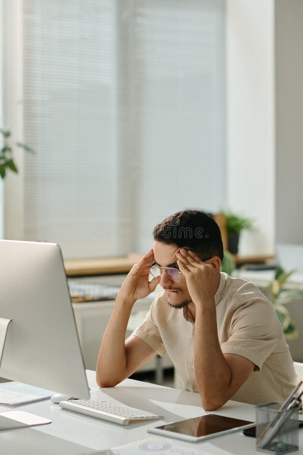 Anxious Office Worker Touching Head Stock Photo - Image of computing ...
