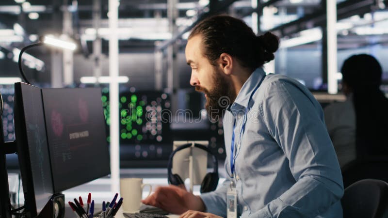 Anxious Technicians in Data Center Reacting To System Lockdown Caused ...