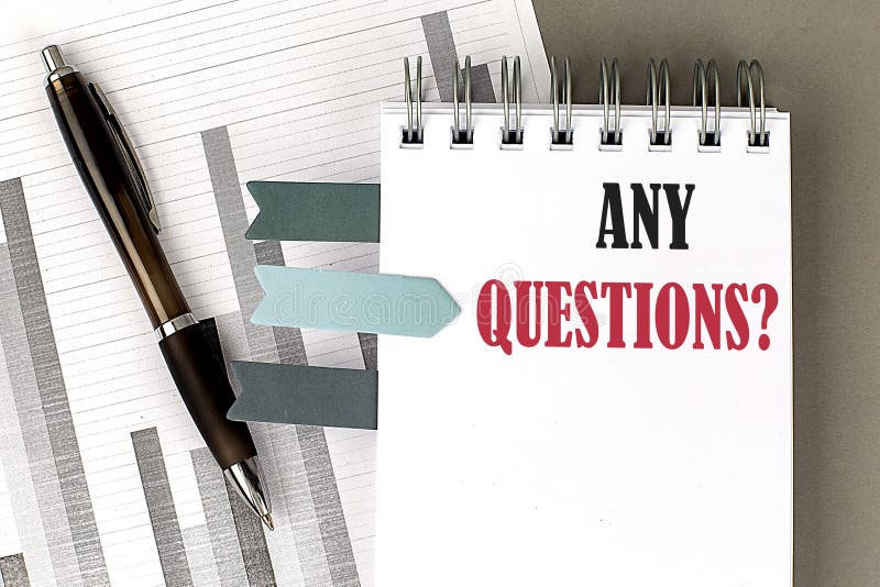 ANY QUESTIONS Text on Notebook with Pen, Calculator and Chart on a Grey ...