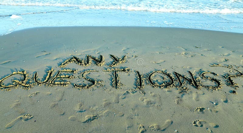 ANY QUESTIONS Written on the Sand of the Sea Stock Image - Image of ...