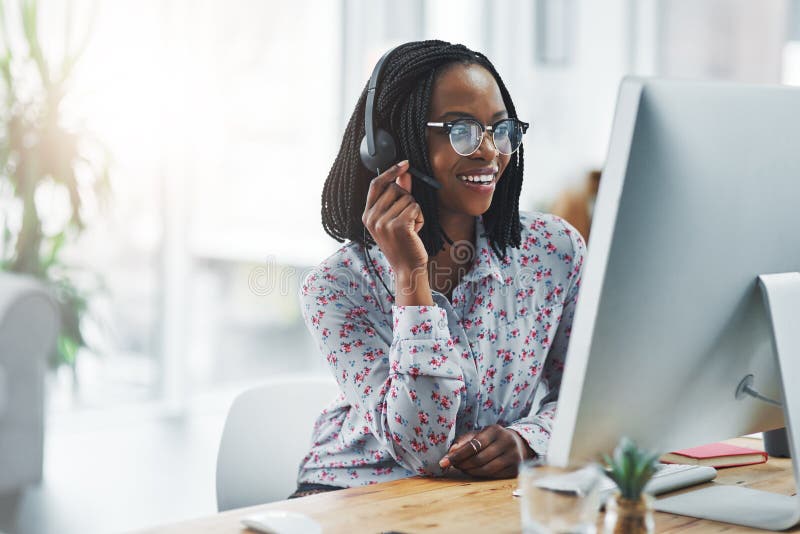 Anything I Can Help with Today. a Young Woman Using a Headset and ...