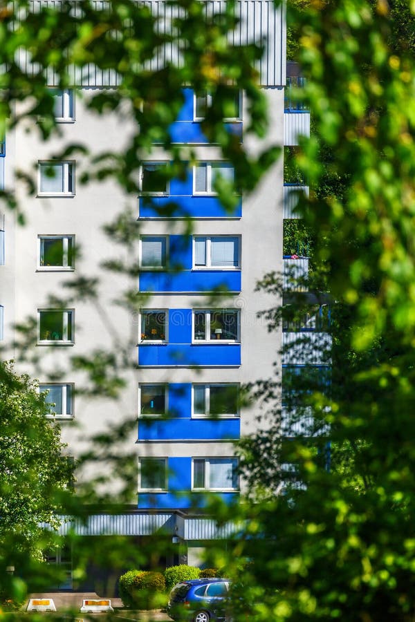 Apartment Building among the Branches in the Summer Stock Image - Image ...