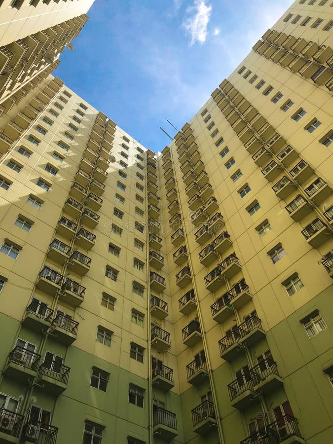 Apartment building stock image. Image of colorful, apartment - 220782925