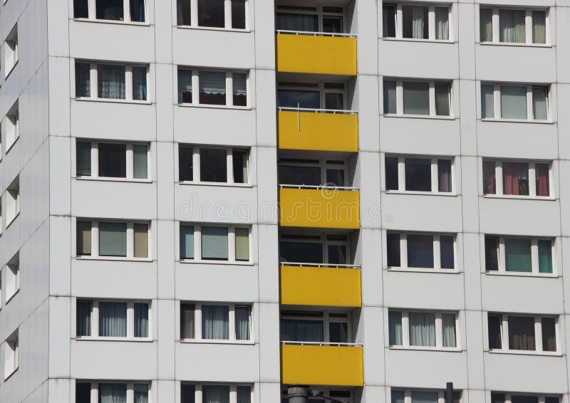 Apartment Building Facade with Yellow Color Balcony Stock Image - Image ...
