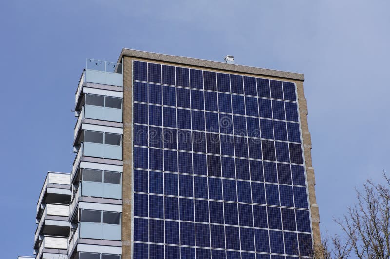 Apartment Building With Solar Panels Stock Photo - Image of mansion ...