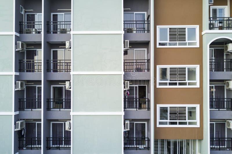 A Apartment Building Windows Pattern Stock Photo - Image of brick ...