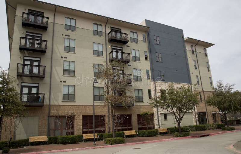 Apartment Buildings with Garage and Balcony Stock Image - Image of ...
