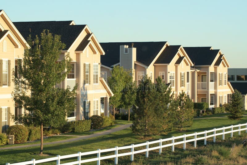 Row of Brick Condos with Bay Windows Stock Photo - Image of expensive ...