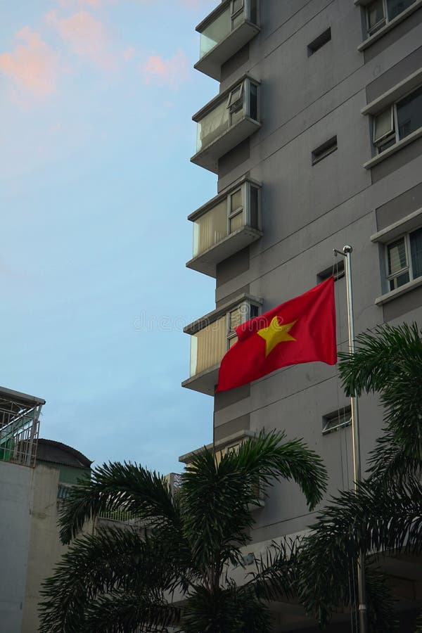 Apartments in Vietnam with Vietnamese Flag Flying Stock Image - Image ...
