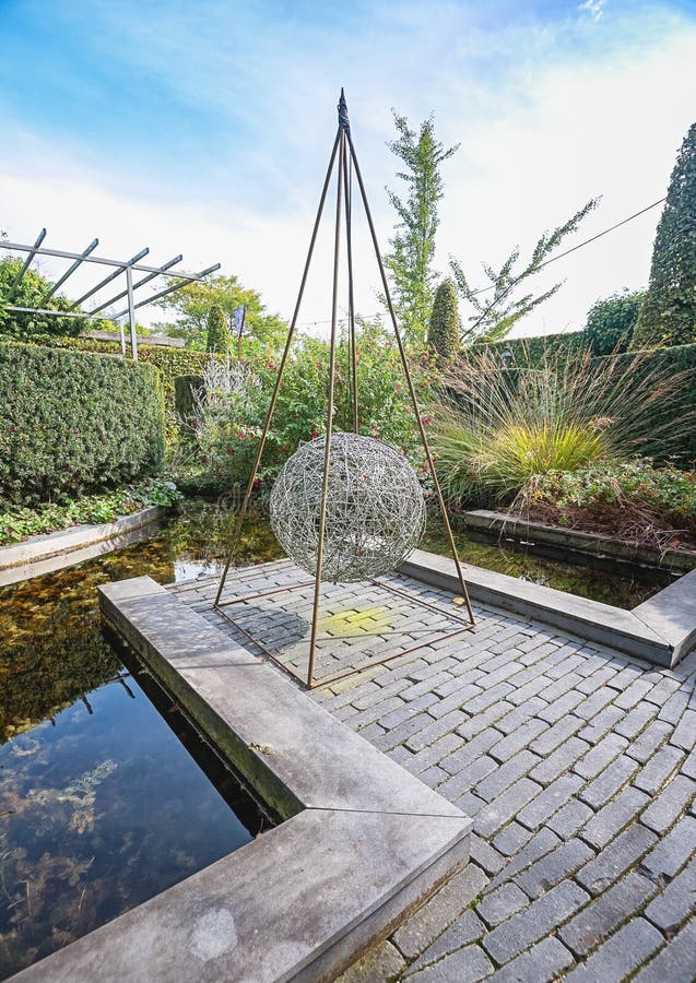Decorative Metal Art Element in the Garden Editorial Photo - Image of ...