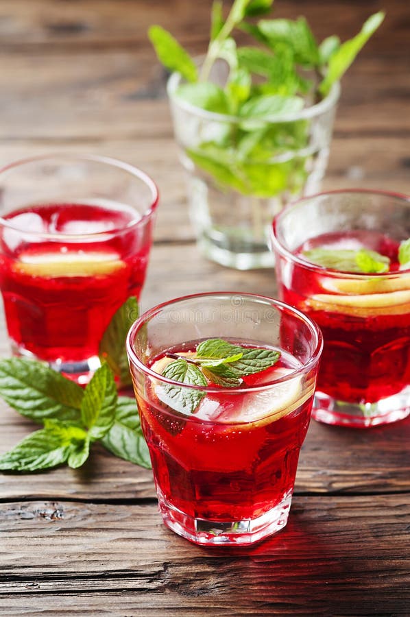 Aperitif with Campari, Mint and Lemon Stock Photo - Image of cool, mint ...