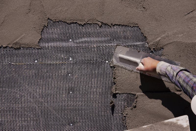 Aplicando o estuque foto de stock. Imagem de manual, estuque - 14192378