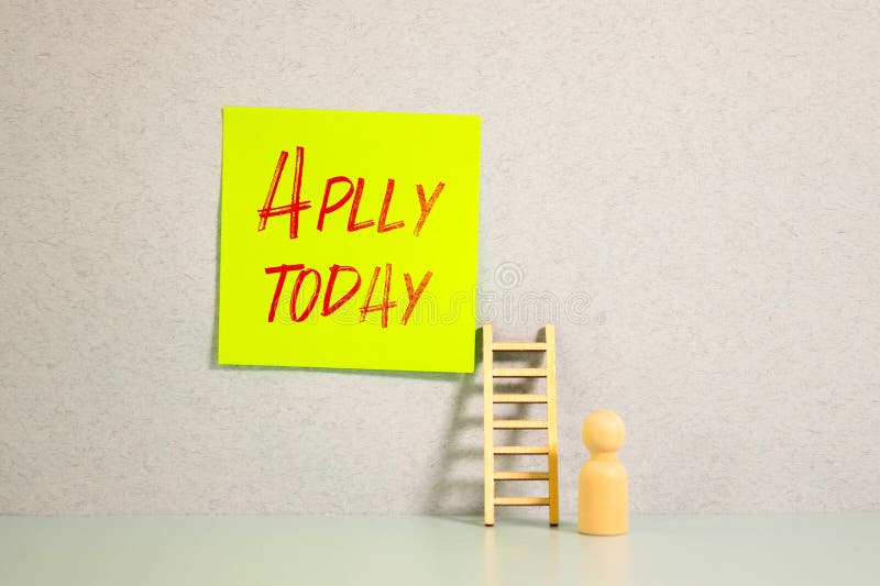 Aplly Today. Content. Text on Blue Sticker on Table Button Holds ...