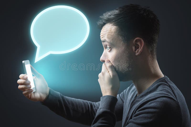 Appalled Man Getting a Message on His Smartphone Stock Image - Image of ...
