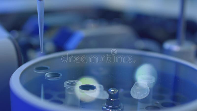 Apparatus for Automatic Sampling, Analysis. a Robo Hand Takes a Sample ...