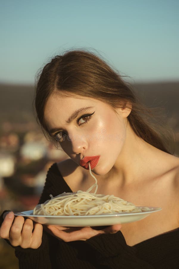 Appetite of Young Woman with Macaroni. Appetite and Hunger of Woman ... Appetite of Young Woman with Macaroni. Appetite and Hunger of Woman ...