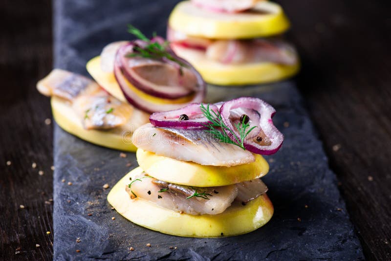Appetizer Canape with Herring, Apples Stock Image - Image of greens ...