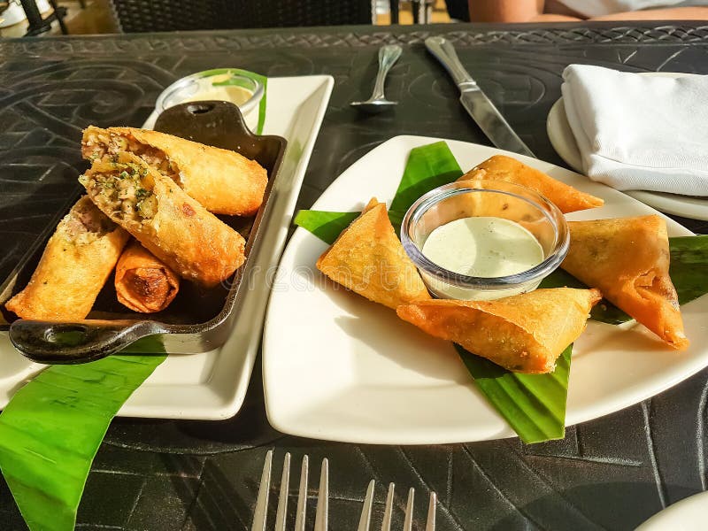 Appetizer Chicken Spring Roll and Samosa White Plate on Table at ...