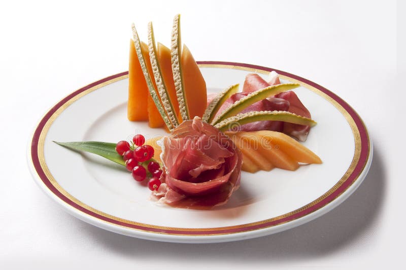Appetizer Parma Ham and Melon with Currants Stock Photo - Image of ...