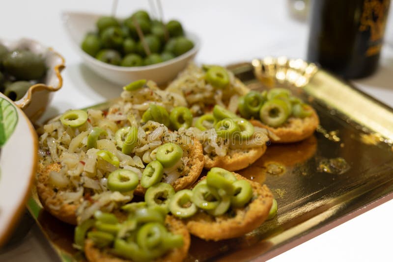 Appetizer of Small Pieces of Toasted Bread with Olives and Oregano ...
