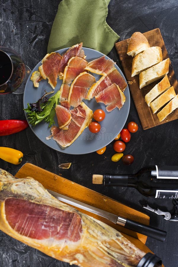Slicing spanish jamon stock photo. Image of spanish - 168126554