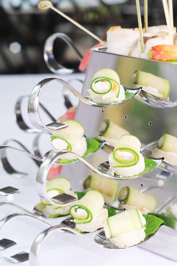 Appetizers on party spoons stock image. Image of green - 40648477