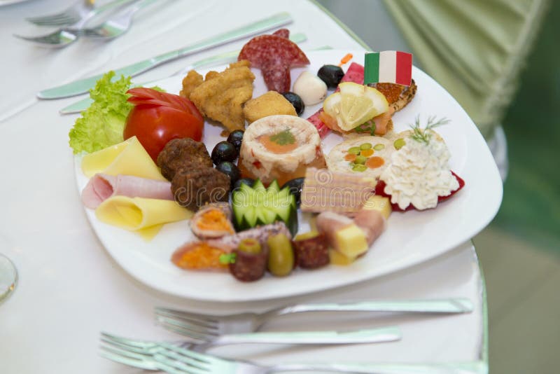 Italian Style Plate with Appetizers Stock Photo - Image of meat, green ...
