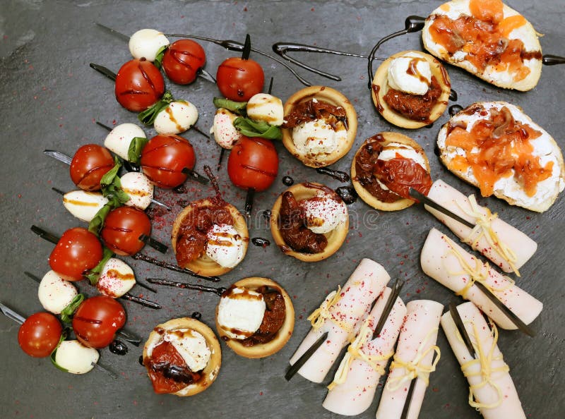 Appetizing Appetizers of Small Canape with Blue Cheese, Mint and Stock ...