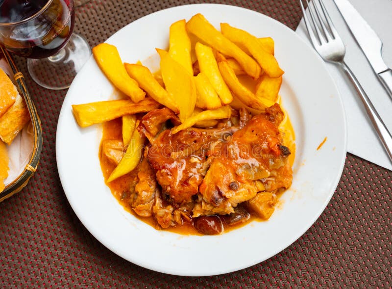 Braised Rabbit Served with Potato Garnish Stock Photo - Image of eating ...