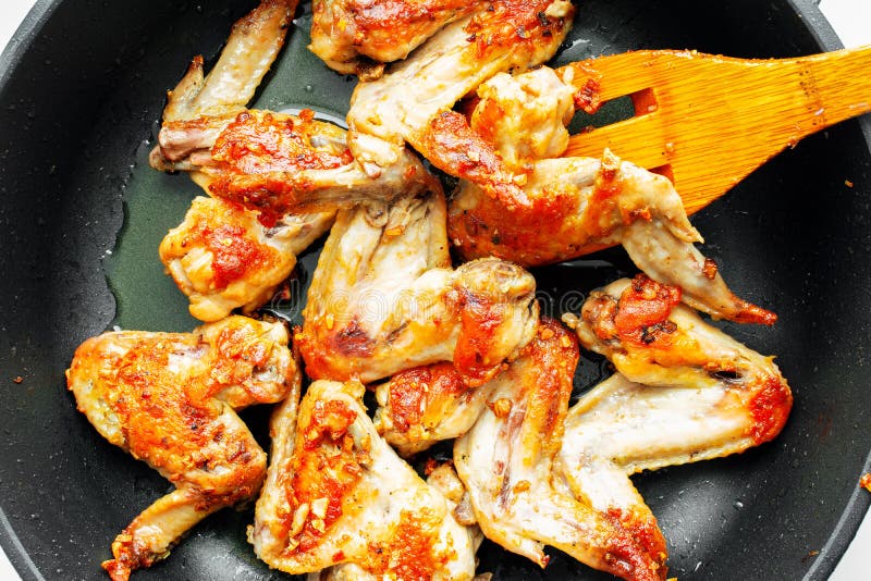 Appetizing Chicken Wings Fried in a Pan Stock Photo - Image of chicken ...