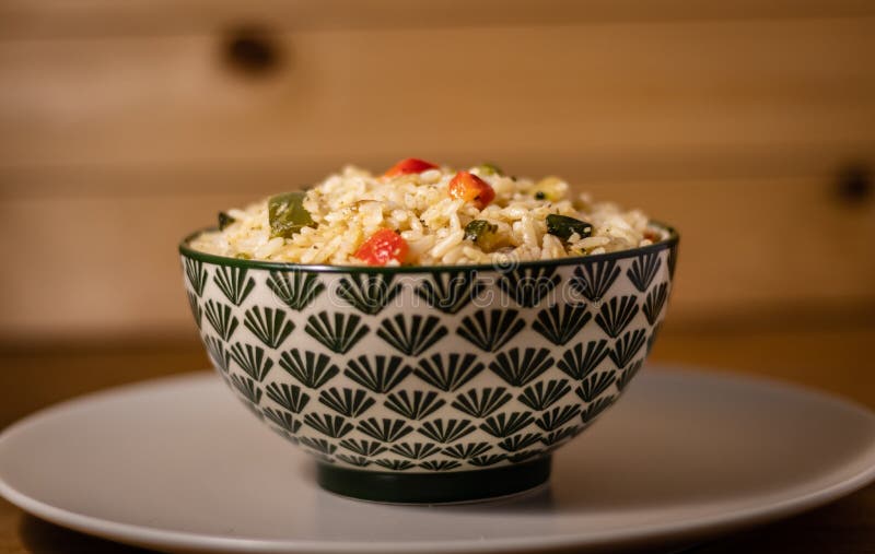 Appetizing Healthy Rice with Vegetables in a Bowl on a Wooden ...