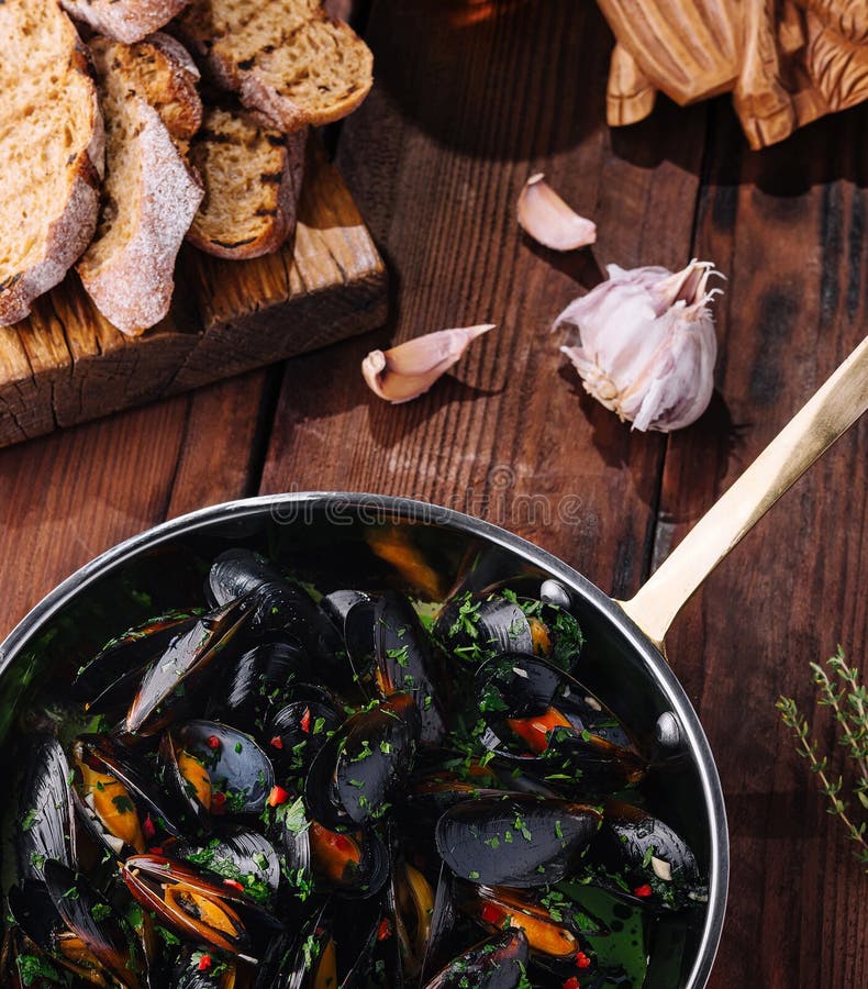 Appetizing Mussels in Herb Broth with Bread Stock Image - Image of ...