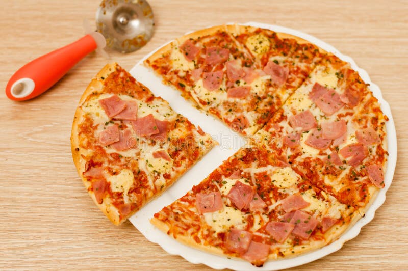 Appetizing pizza with ham stock image. Image of food - 23423143