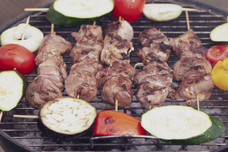 Appetizing Pork with Vegetables is Cooked in the Grill Stock Photo ...