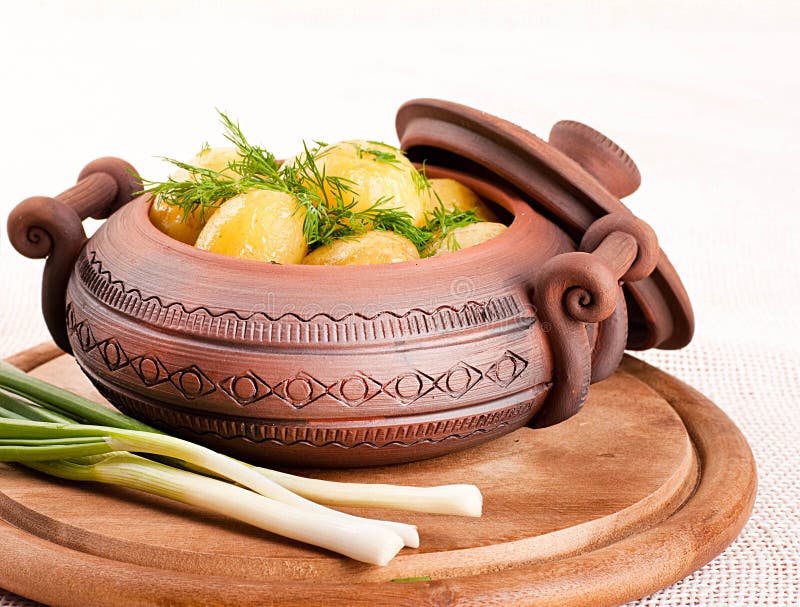 Appetizing potato in a pot stock image. Image of color - 31788003