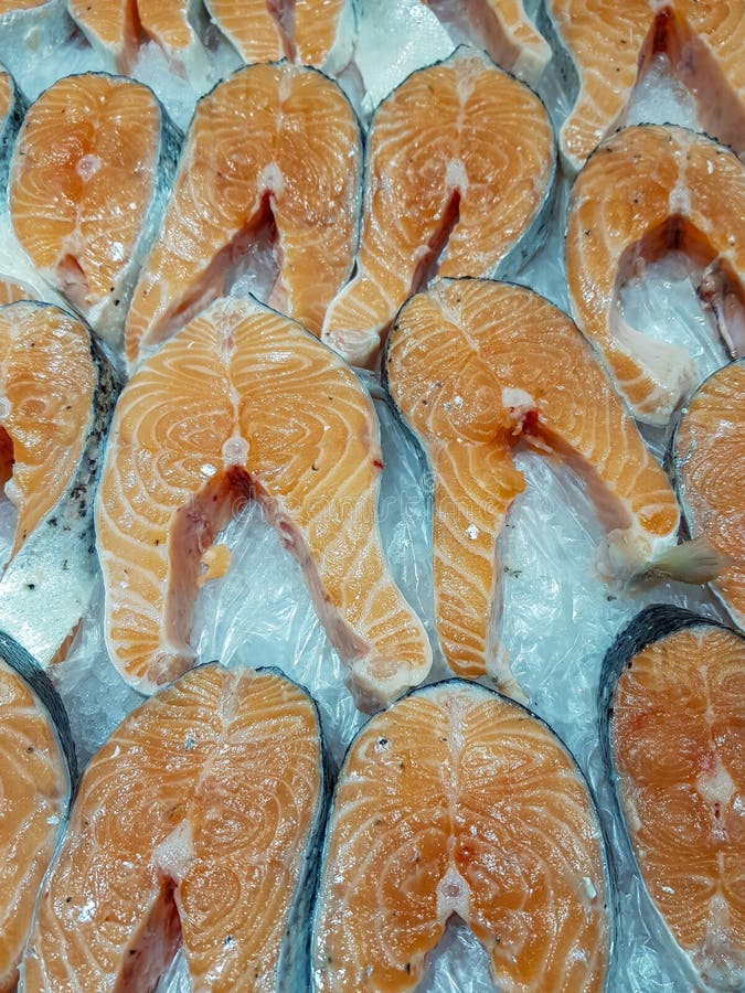 Appetizing raw fish steaks stock image. Image of fillet - 143694777