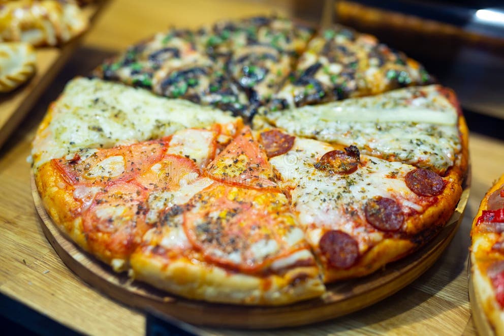 Appetizing Slices of Pizza on Grocery Store Window Stock Image - Image ...