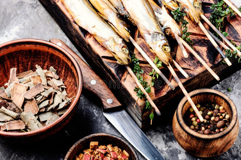 Appetizing smoked fish stock image. Image of peppercorn - 135211929