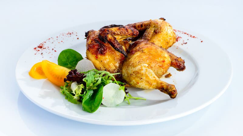 Appetizing Spicy Baked Mini Chicken on the Plate on Light Background ...