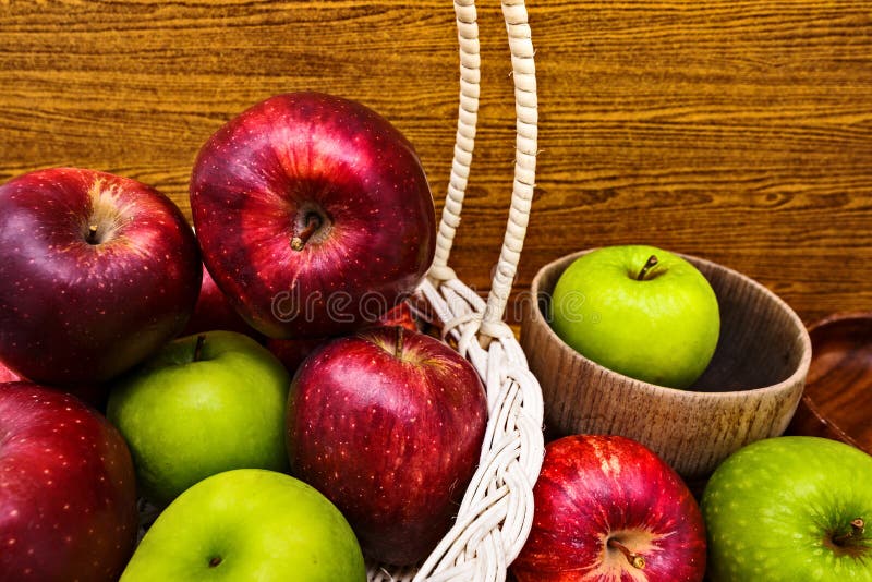 Apple are in Basket and on the Wood Table. Stock Image - Image of ...