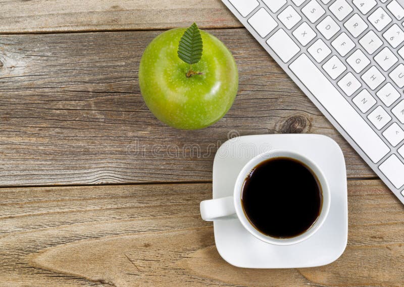 Apple and Black Coffee with Computer Keyboard for School or Offi Stock ...