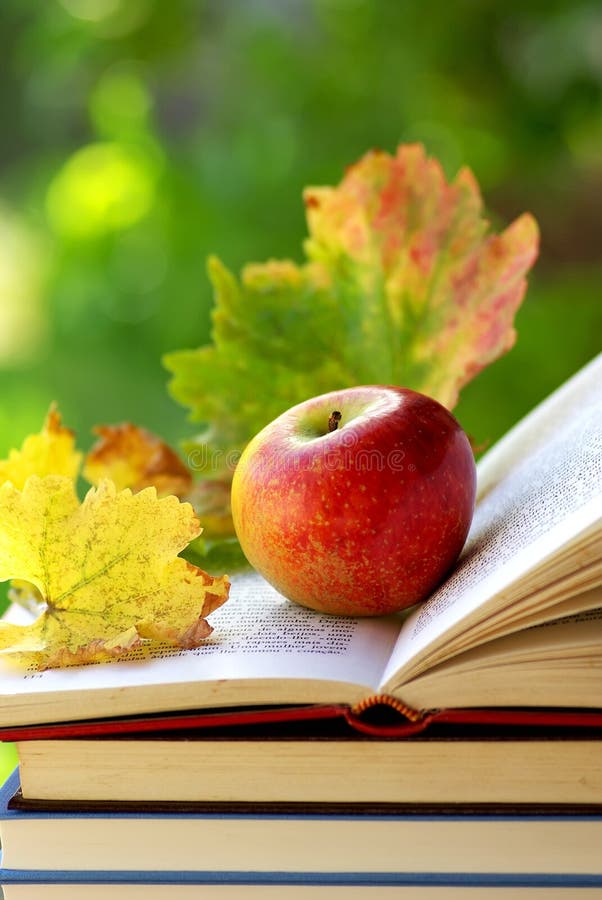 Apple on book. stock image. Image of back, leaves, retro - 15290331