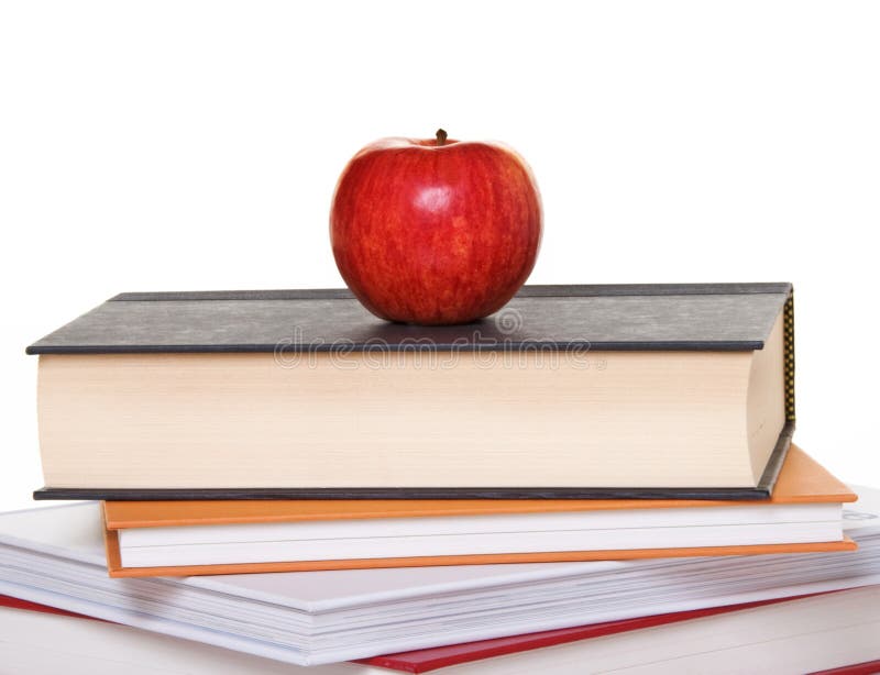Apple on Book Stack stock photo. Image of isolated, white - 18789178